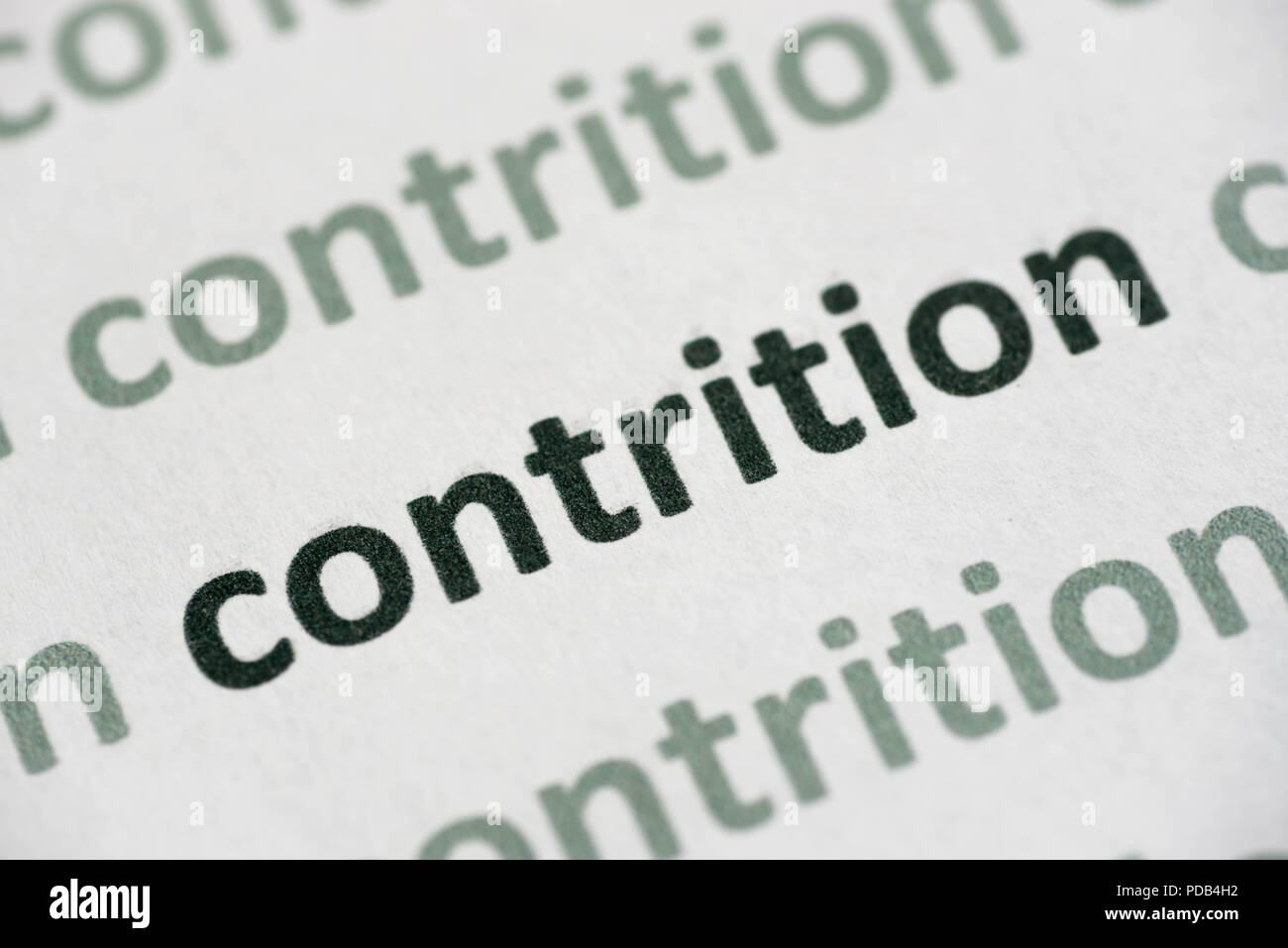 word contrition printed on white paper macro Stock Photo - Alamy