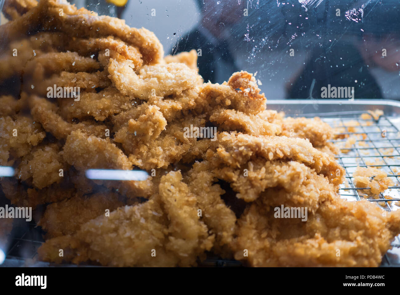 Crispy fried pork displayed in the cabinet Stock Photo - Alamy