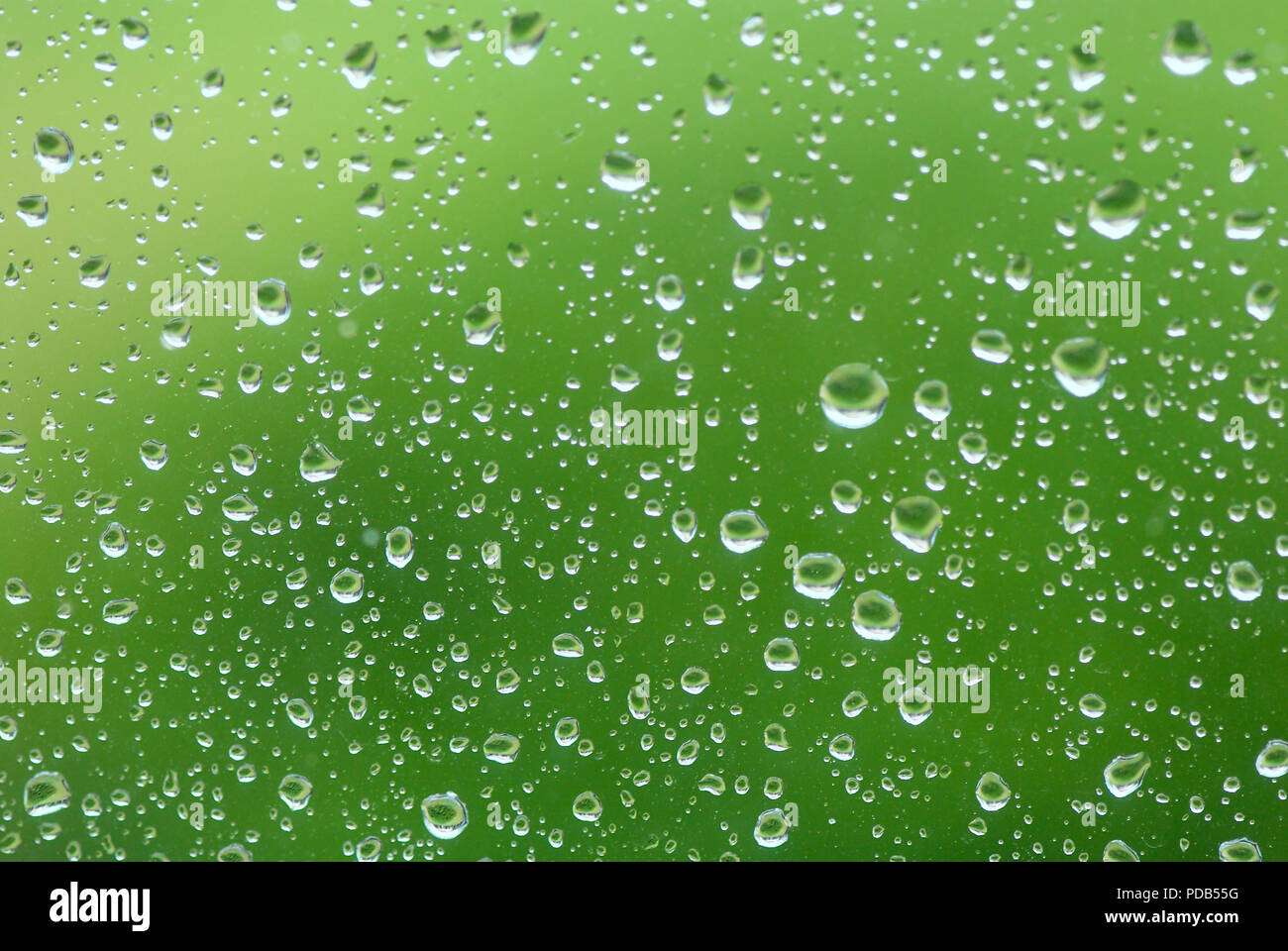 Drops of a rain on glasses. Close up Stock Photo - Alamy