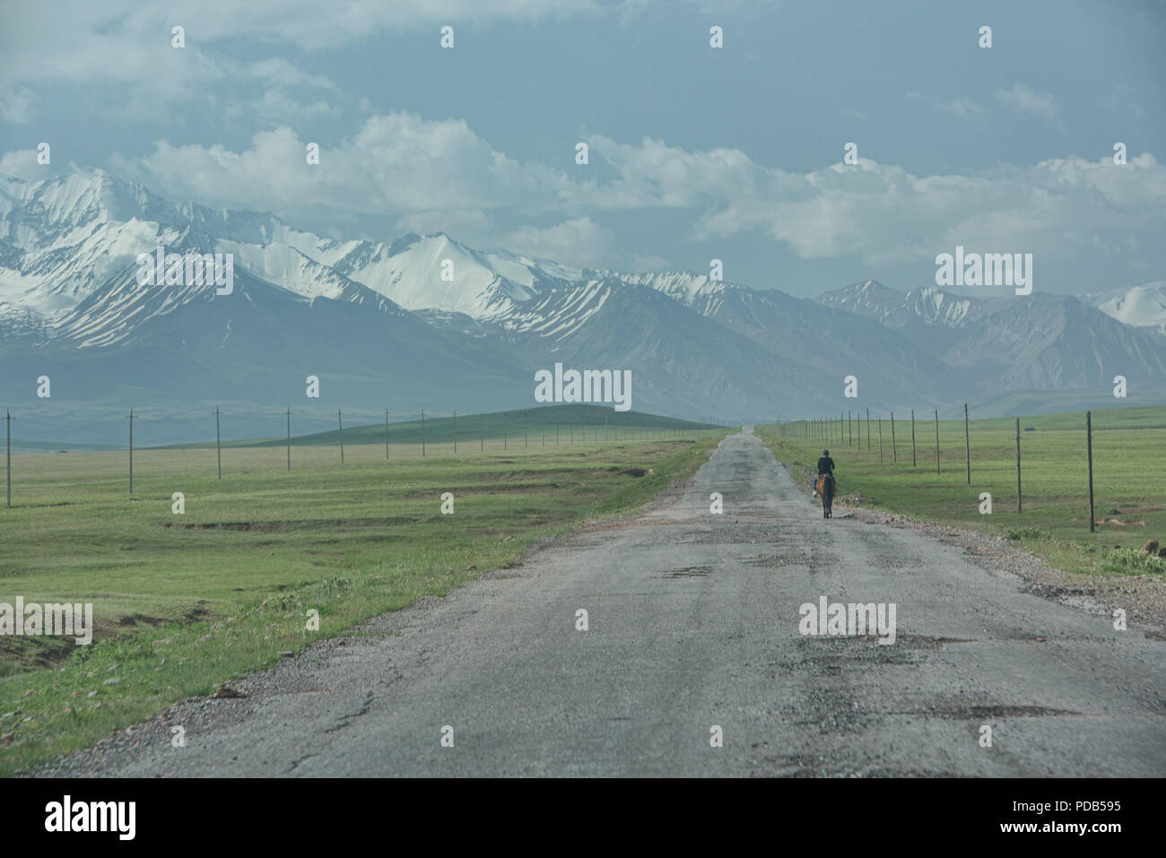 Lone horseman under the High Pamirs, Sary Tash, Kyrgyzstan Stock Photo ...