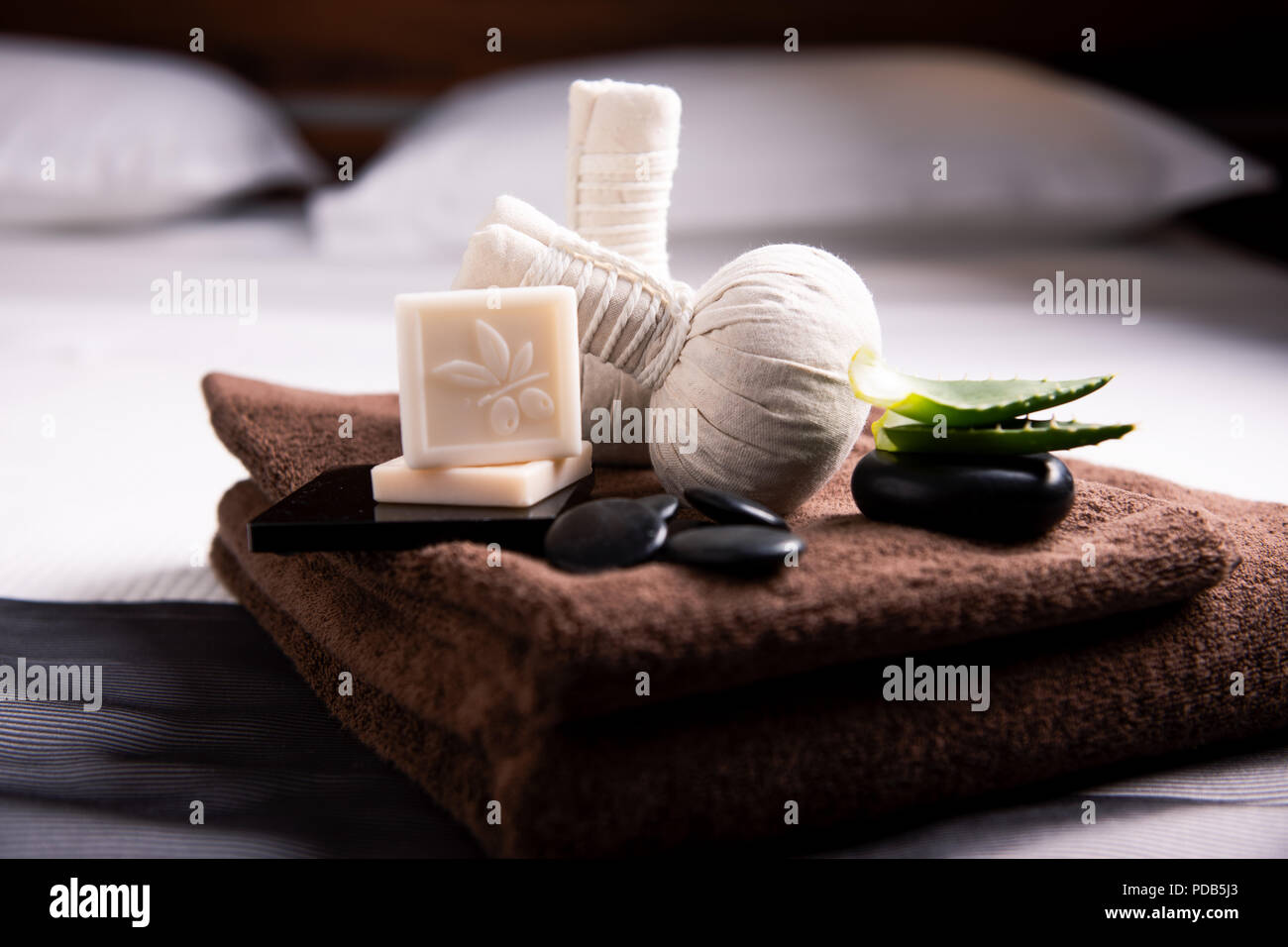 Spa setting on a bed room hotel. Close up Stock Photo - Alamy
