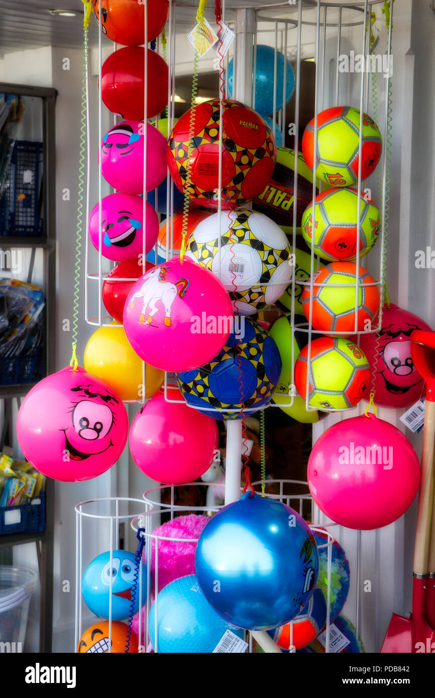 Colourful balls in shop display Stock Photo - Alamy
