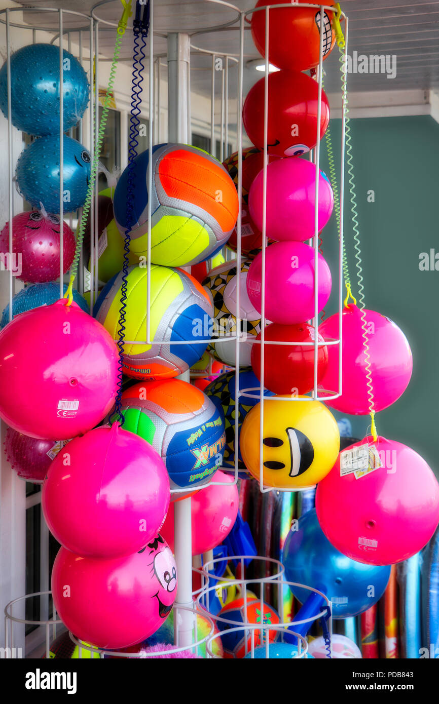 Colourful balls in shop display Stock Photo - Alamy
