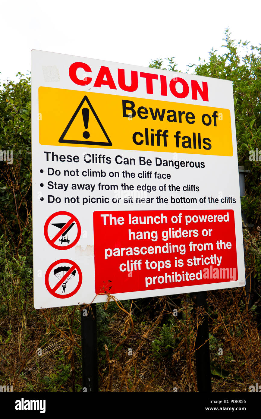Caution Beware of Cliffs sign Stock Photo - Alamy