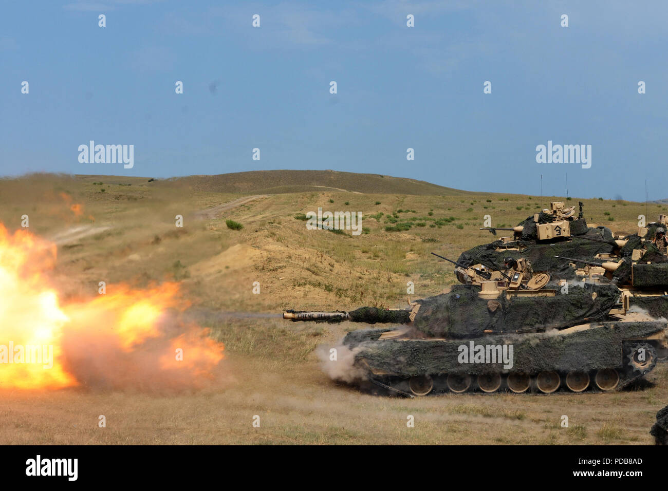 A M1A2 Abrams tank crew assigned to Charlie Company, 2nd Battalion, 5th ...