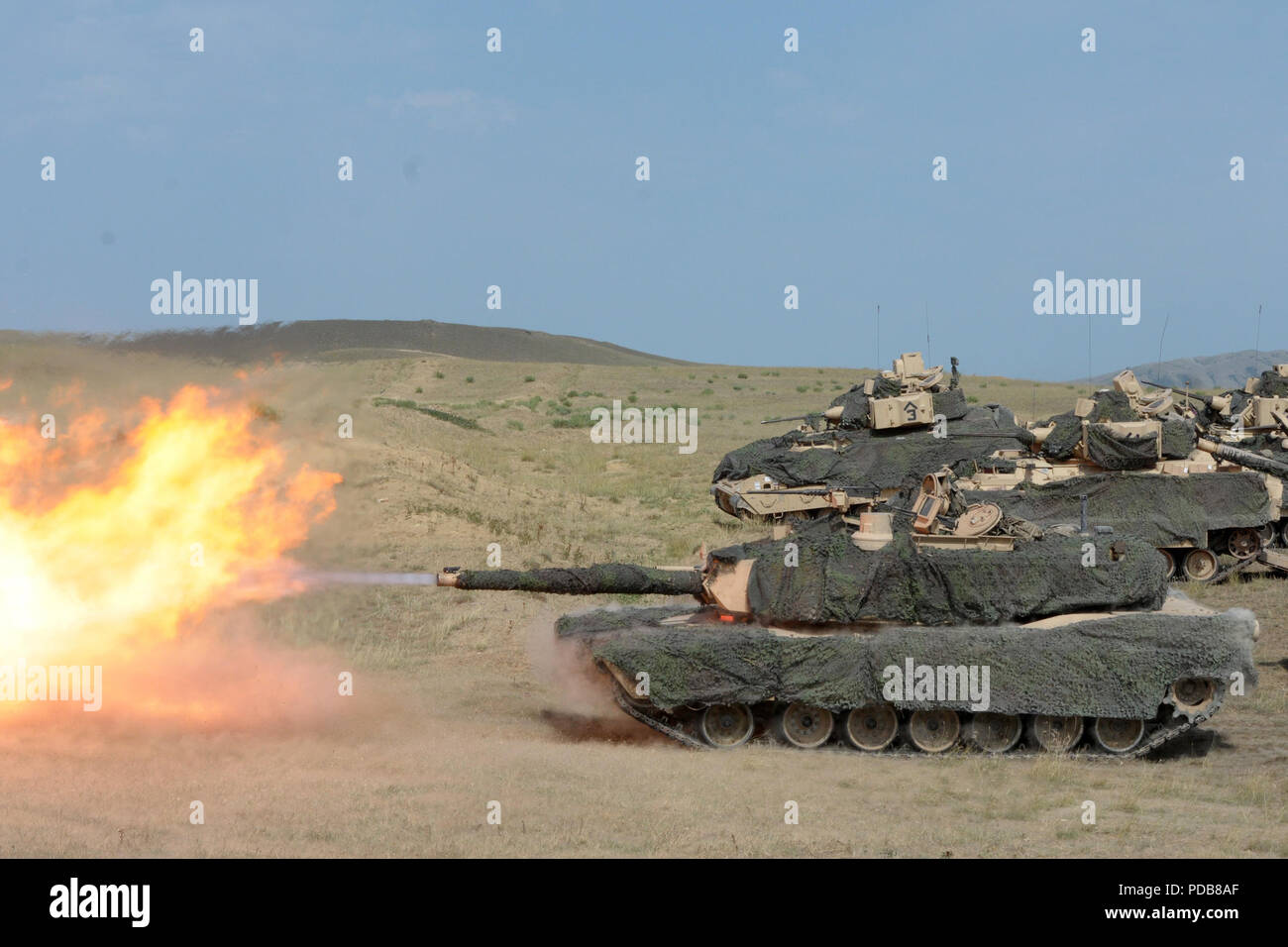 A M1A2 Abrams tank crew assigned to Charlie Company, 2nd Battalion, 5th ...