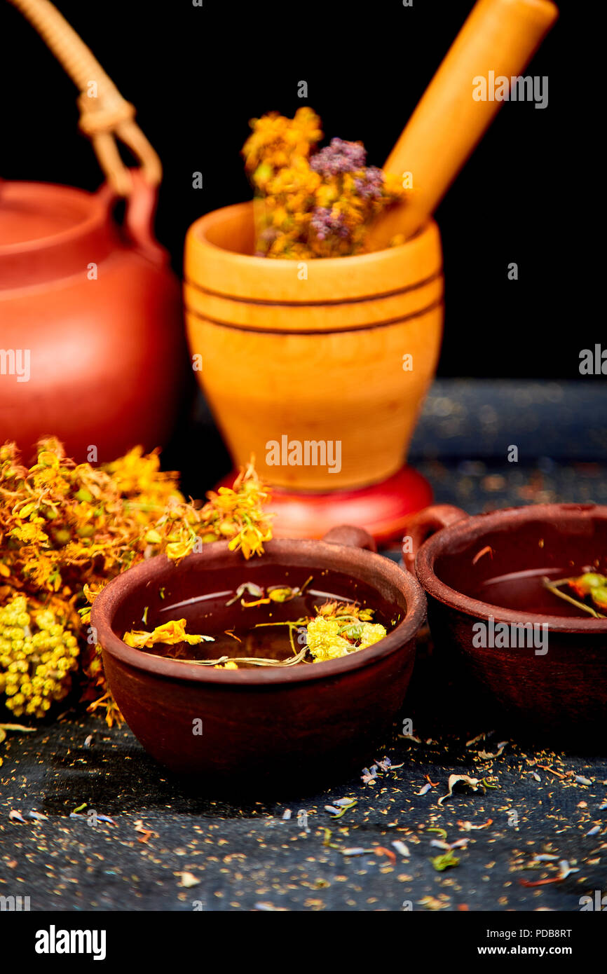 Cup of herbal tea - tutsan, sagebrush, oregano, helichrysum, lavender ...