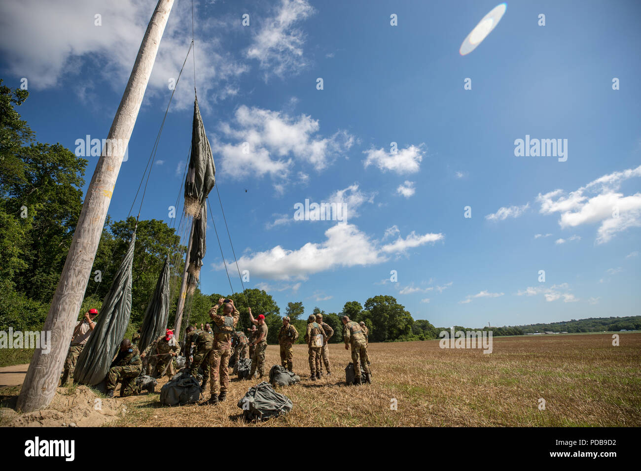 U.S. Army riggers work with paratroopers from Botswana, Italy, and ...