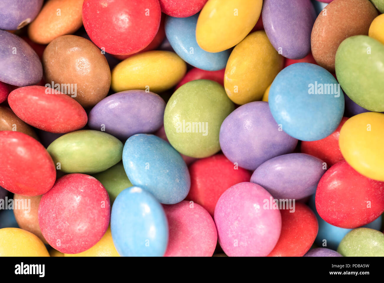 Coated candies hi-res stock photography and images - Alamy