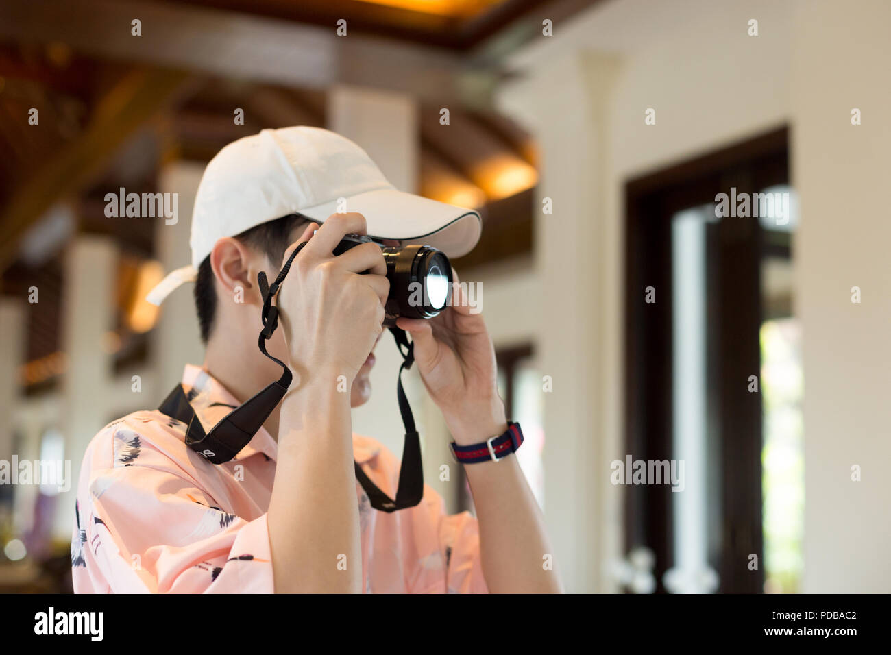 Young tourist taking picture with compact camera on vacation Stock ...