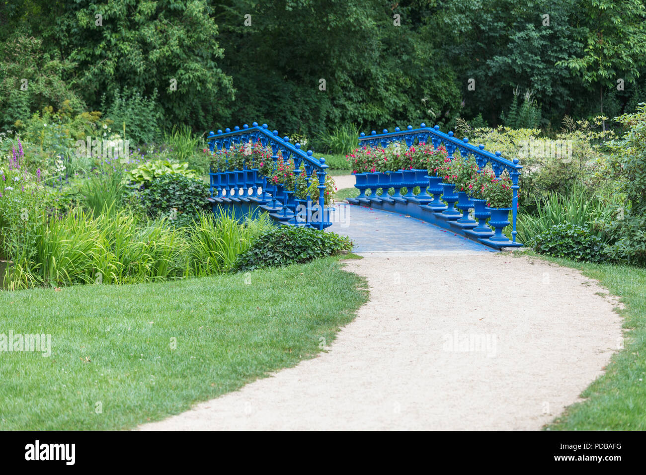 old blue bridge in the Fuerst Pueckler park in Bad Muskau Germany Stock ...