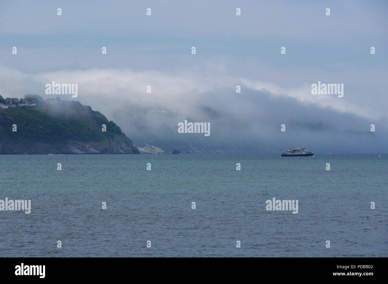 Sea Fog Rolling over Cliffs and the Blue Sea of the English Riviera ...
