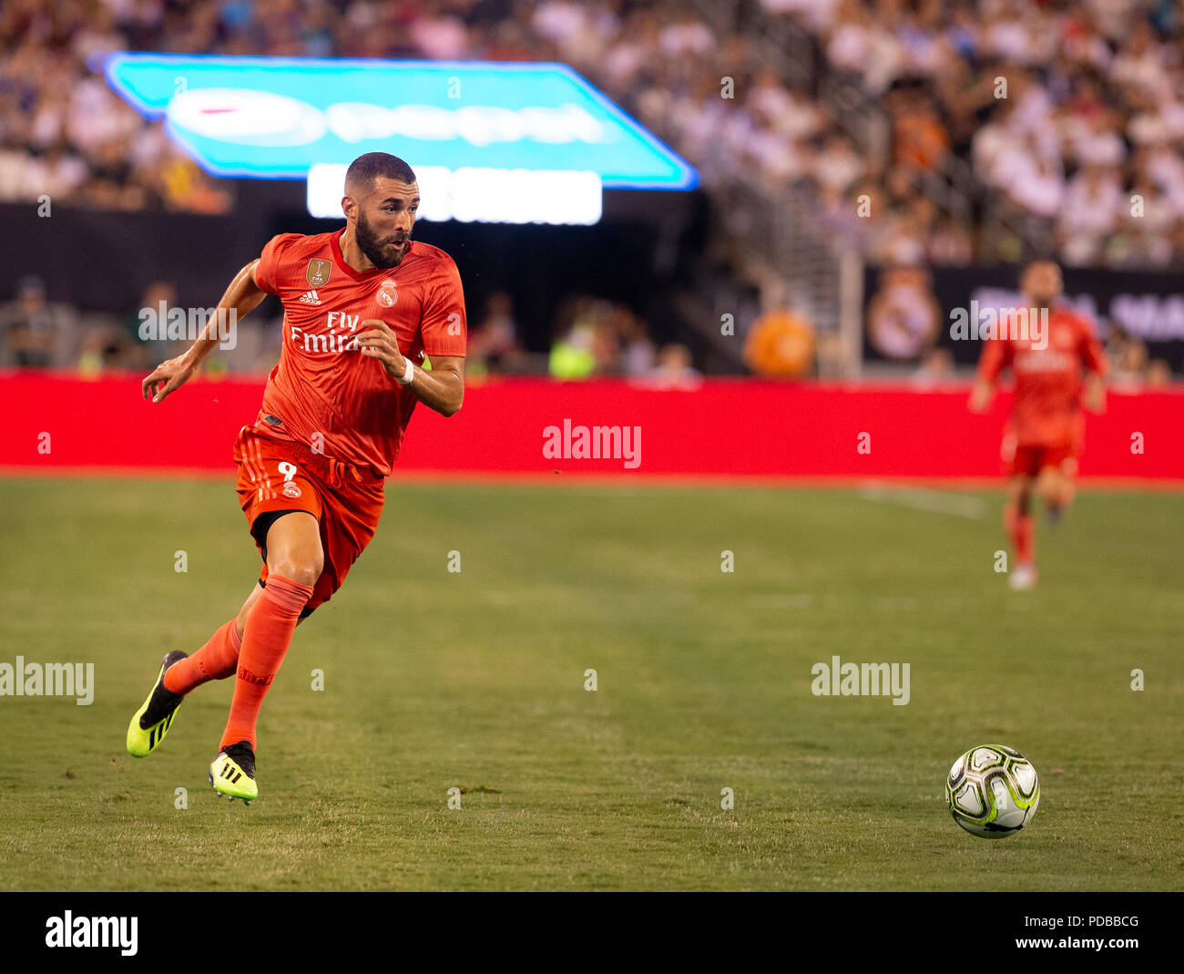 Karim Benzema (9) of Real Madrid controls ball during ICC game against ...