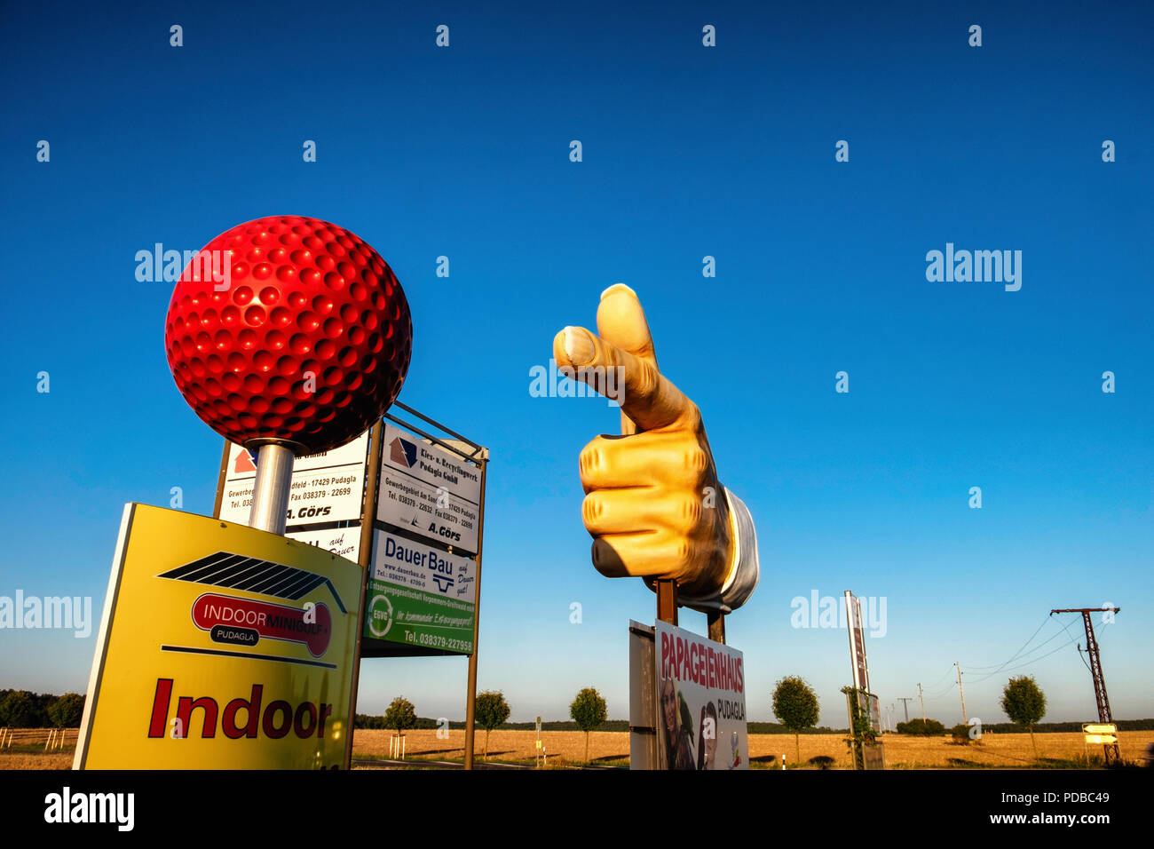Signs advertise amusement parks & family fun at Pudagla Business park ...