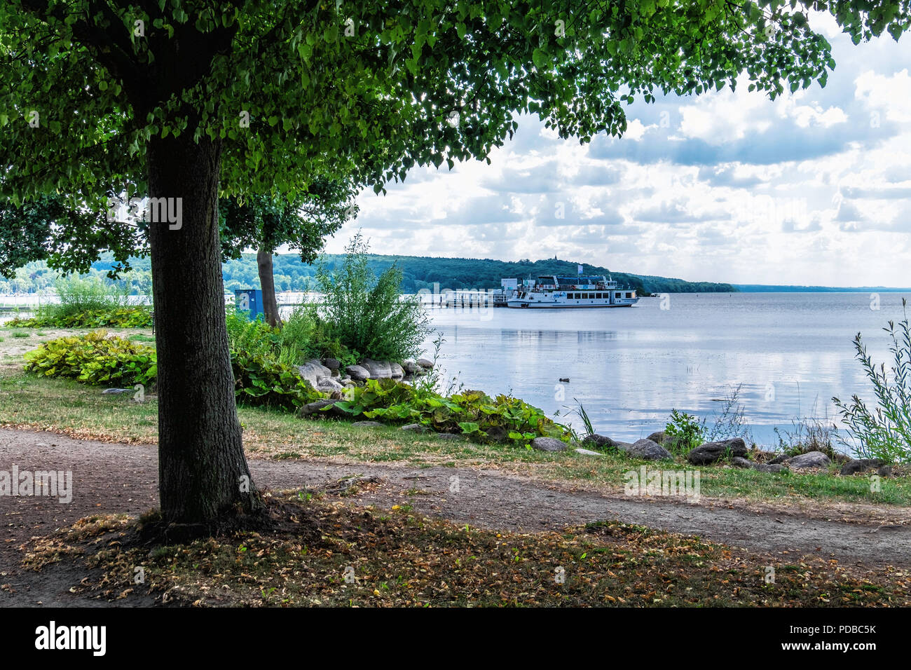 Tollensee lake, Pier & pleasure boat. Popular swimming spot & holiday ...
