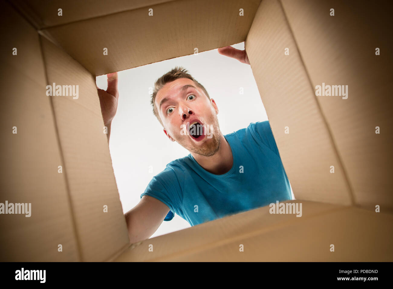 Unpacking the package hi-res stock photography and images - Alamy
