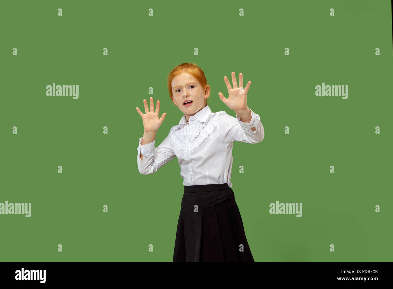 I'm afraid. Fright. Portrait of the scared teen girl. She standing ...