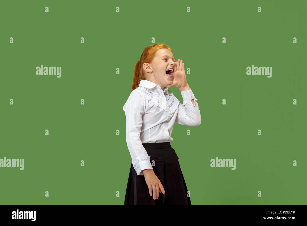 Do not miss. Young casual teen girl shouting. Shout. Crying emotional ...