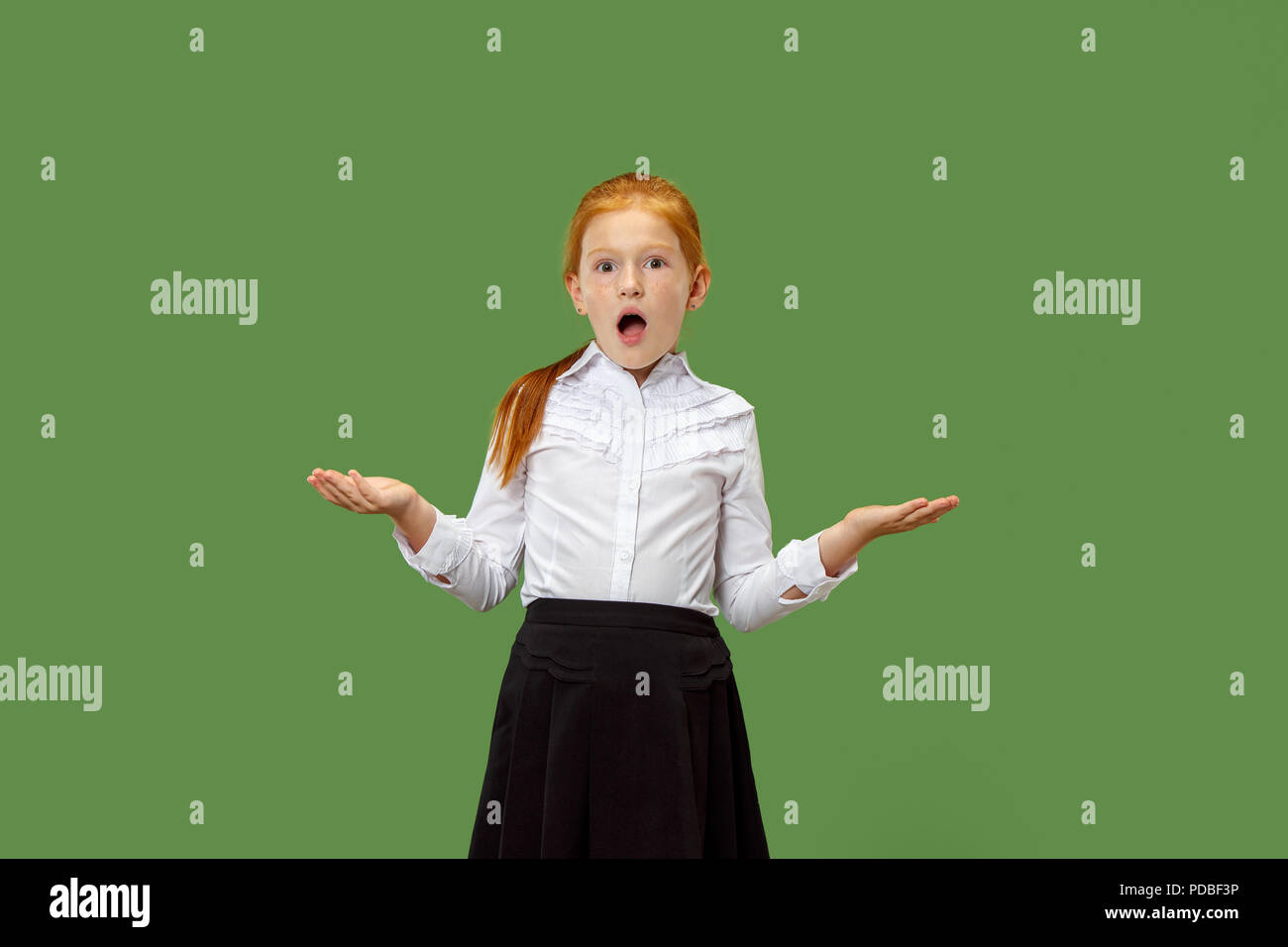 Wow. Beautiful female half-length front portrait isolated on green ...