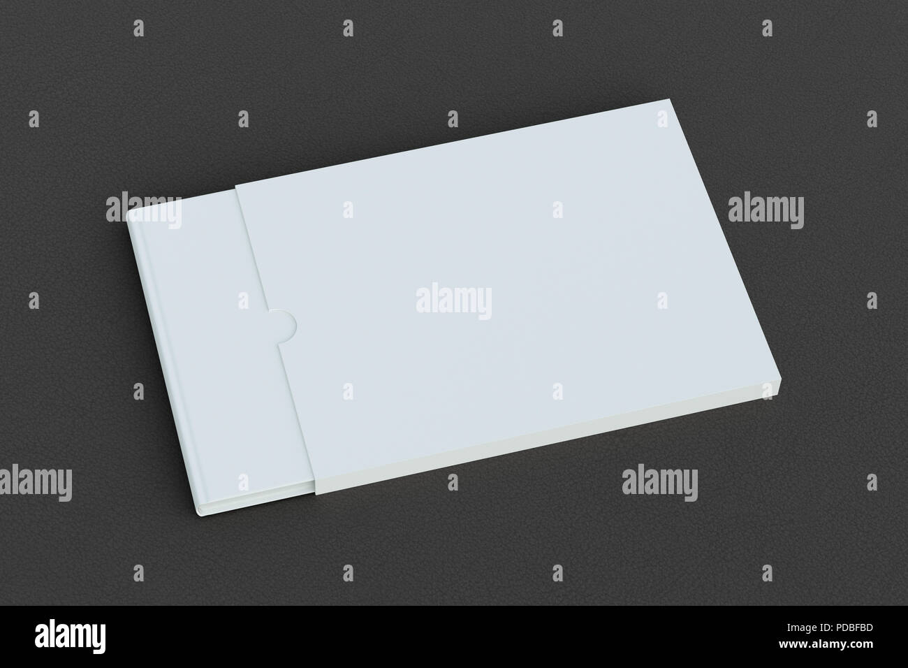 Blank horizontal book in box on black leather. Include clipping path ...