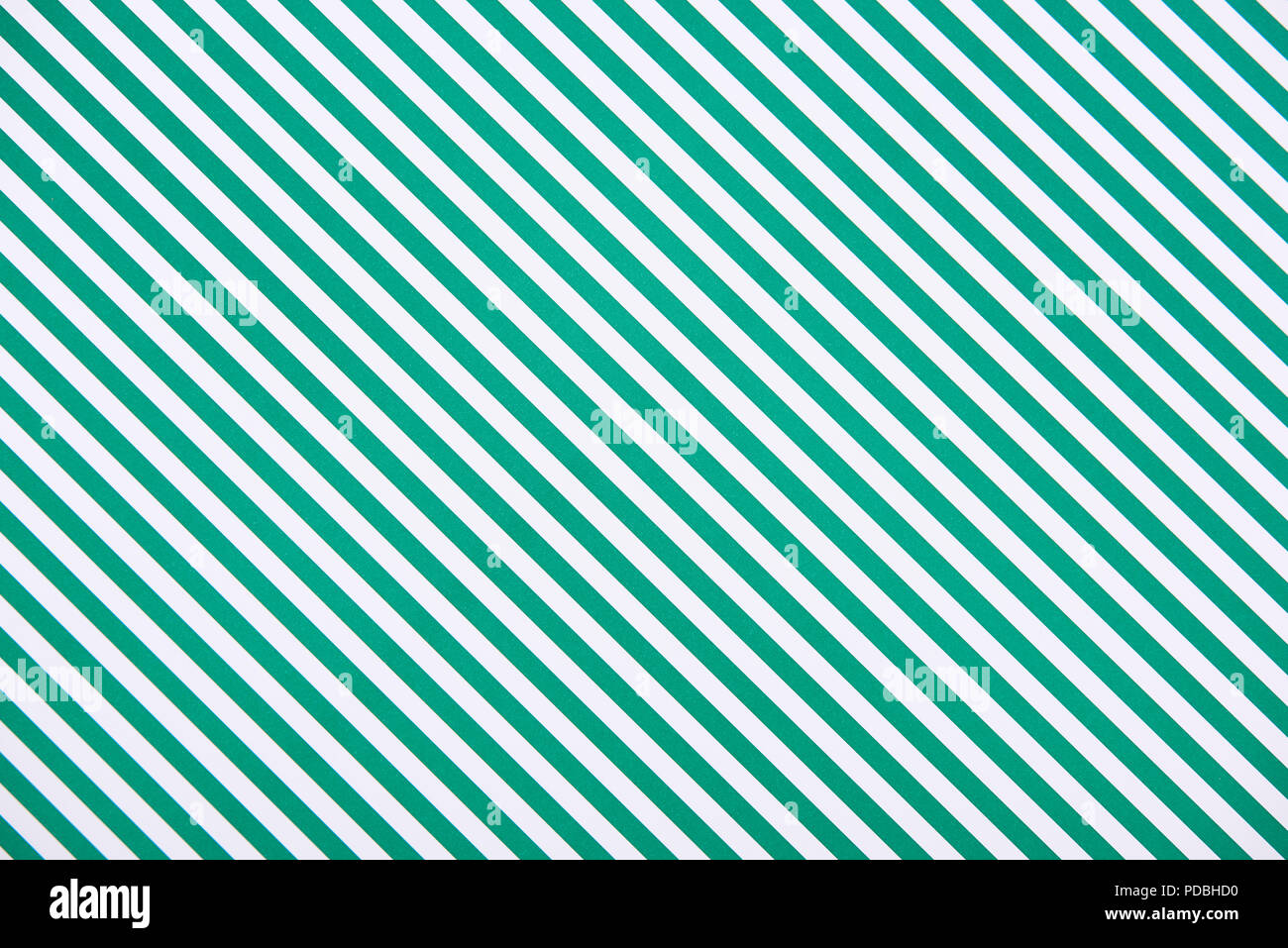 Striped diagonal green and white pattern texture Stock Photo - Alamy