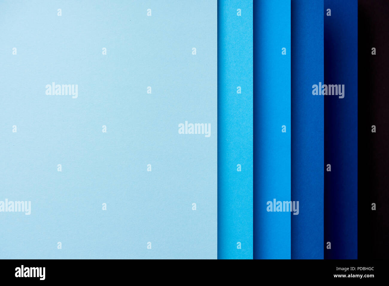 Pattern of vertical overlapping paper sheets in blue tones Stock Photo ...