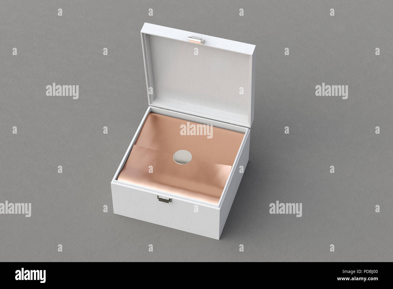 Open white small chest or casket with foil on gray background. Include ...