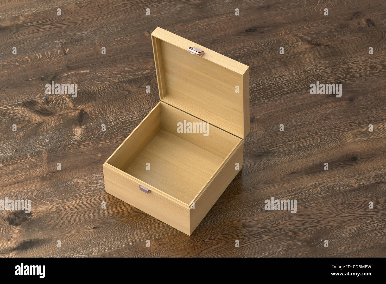 Open wooden small chest or casket on wooden background. Include ...