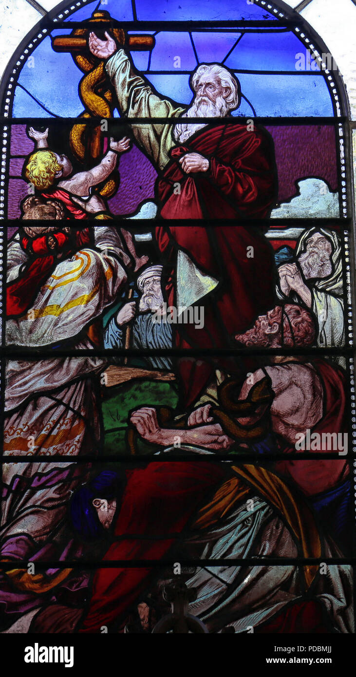 Victorian stained glass window depicting Moses lifting up the serpent ...