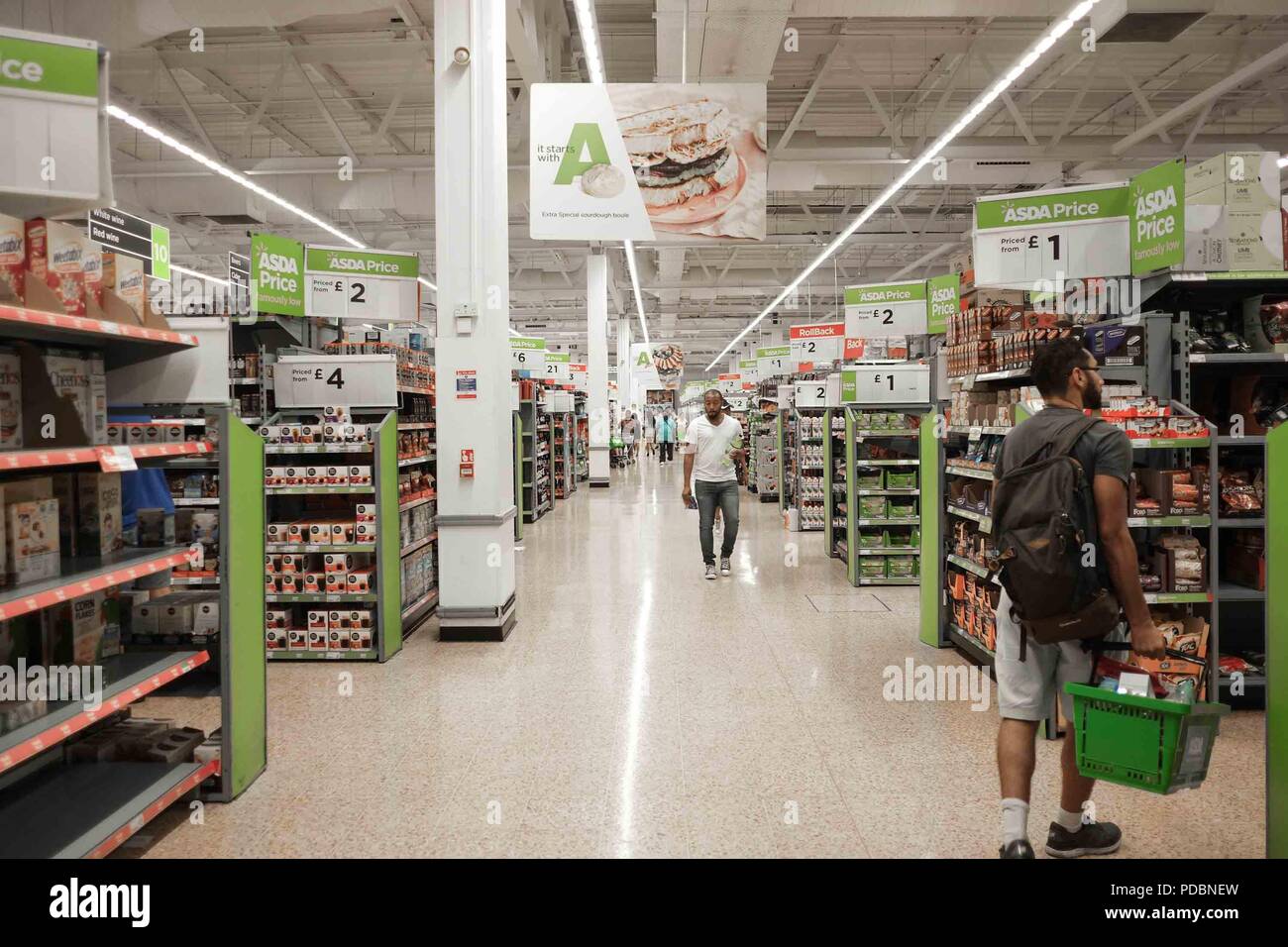 Men shopping in Asda supermarket Stock Photo - Alamy