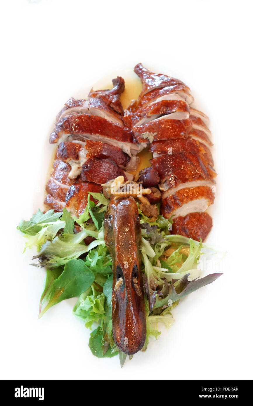 Roasted duck Chinese style, isolated on white Stock Photo - Alamy