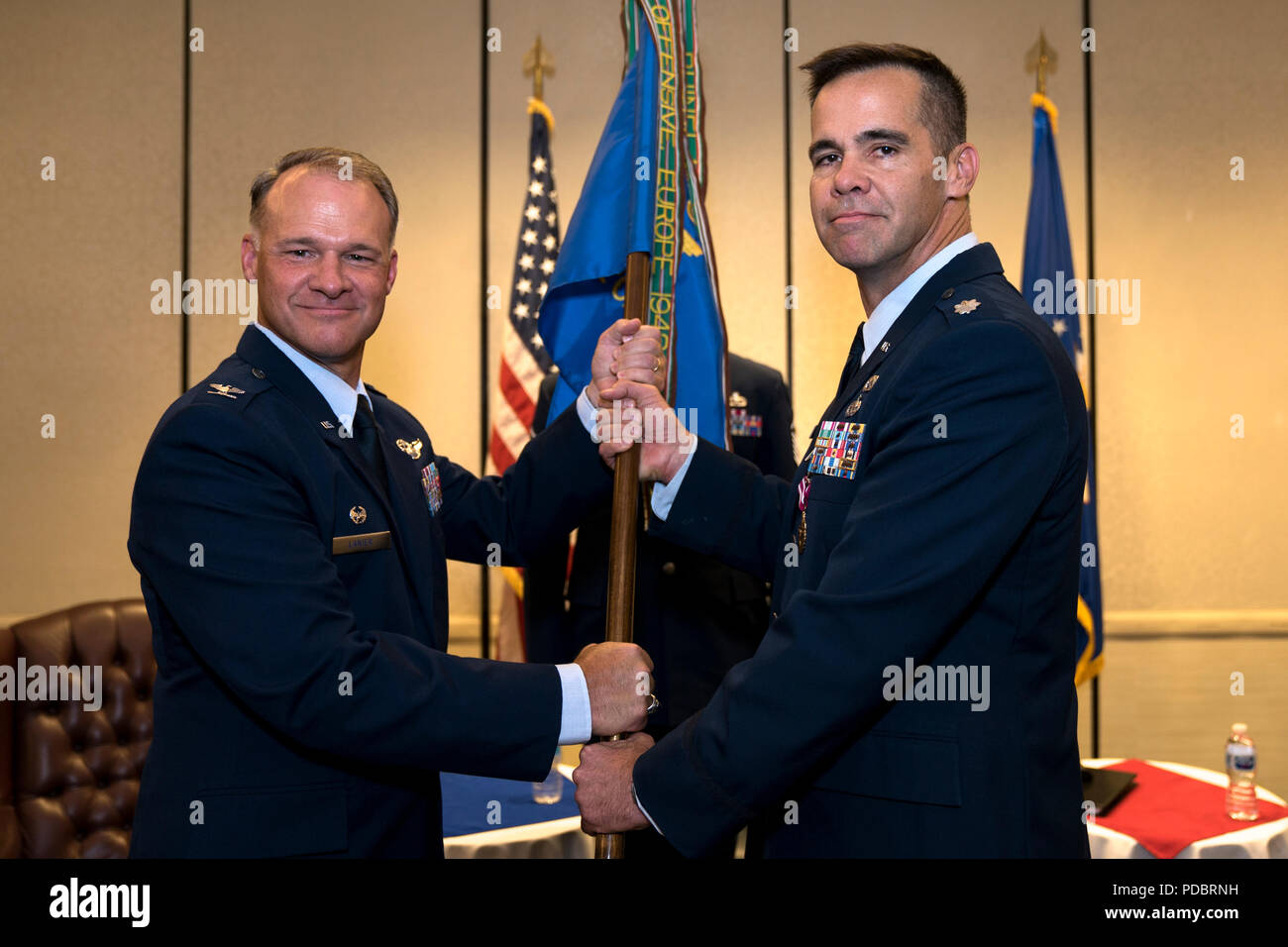 Col. Stephen Lanier, left, 315th Operations Group commander, receives ...