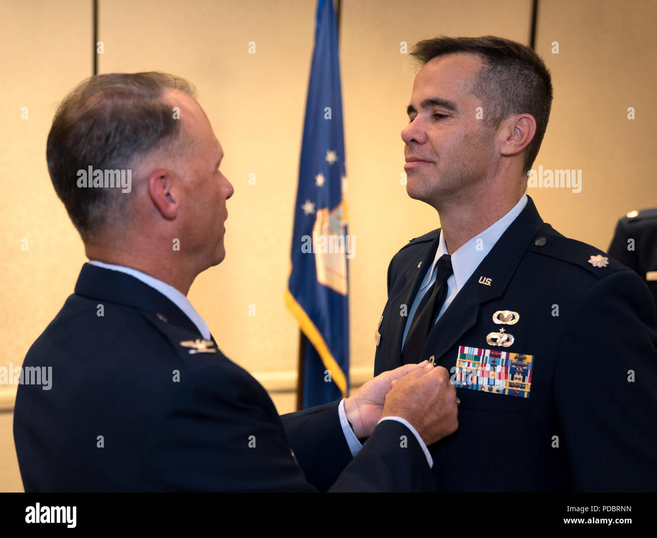 Col. Stephen Lanier, 315th Operations Group commander, presents a ...