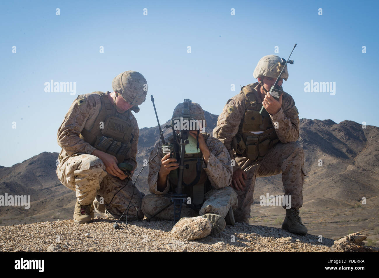 U.S. Marine Corps Sgt. Elijah Smith, left, Cpl. Xavier Tapia, middle ...