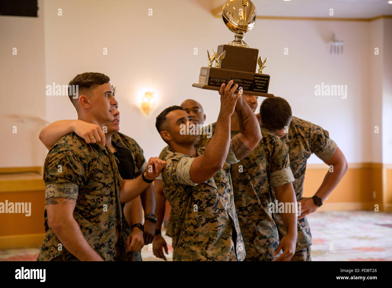CAMP HANSEN, OKINAWA, Japan- Members of the Hansen Outlaws hold their ...