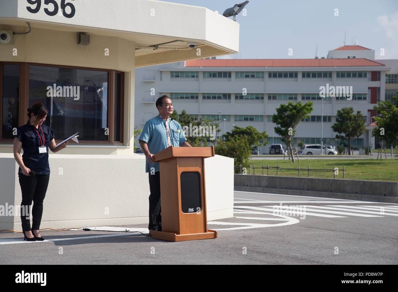 CAMP FOSTER, GINOWAN CITY, OKINAWA, Japan- Atsushi Sakima speaks during ...