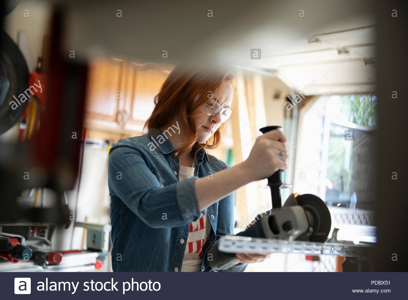 Woman garage hi-res stock photography and images - Alamy