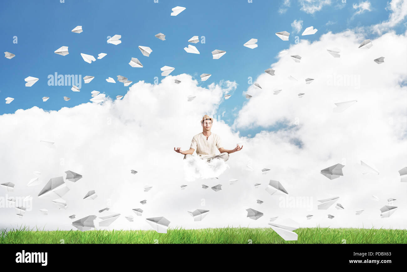 Young man keeping mind conscious Stock Photo - Alamy