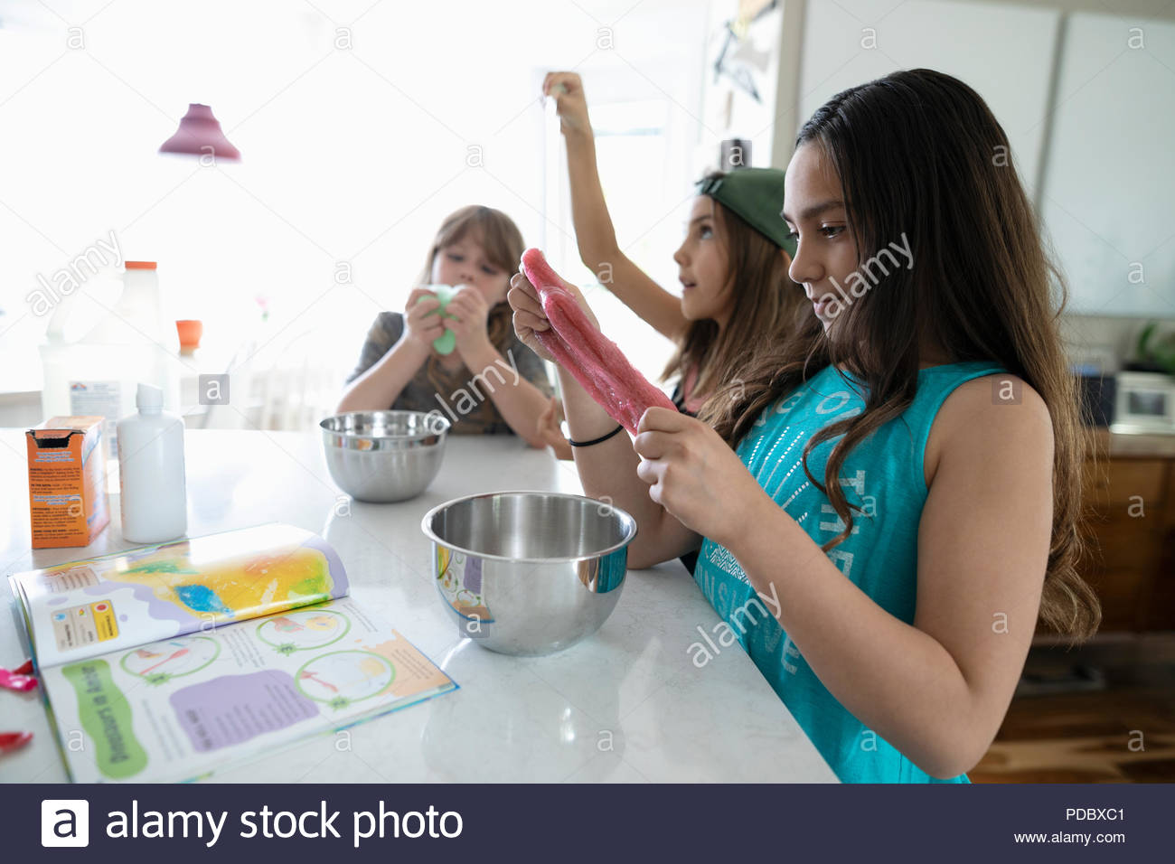 Girl standing on a counter hi-res stock photography and images - Alamy
