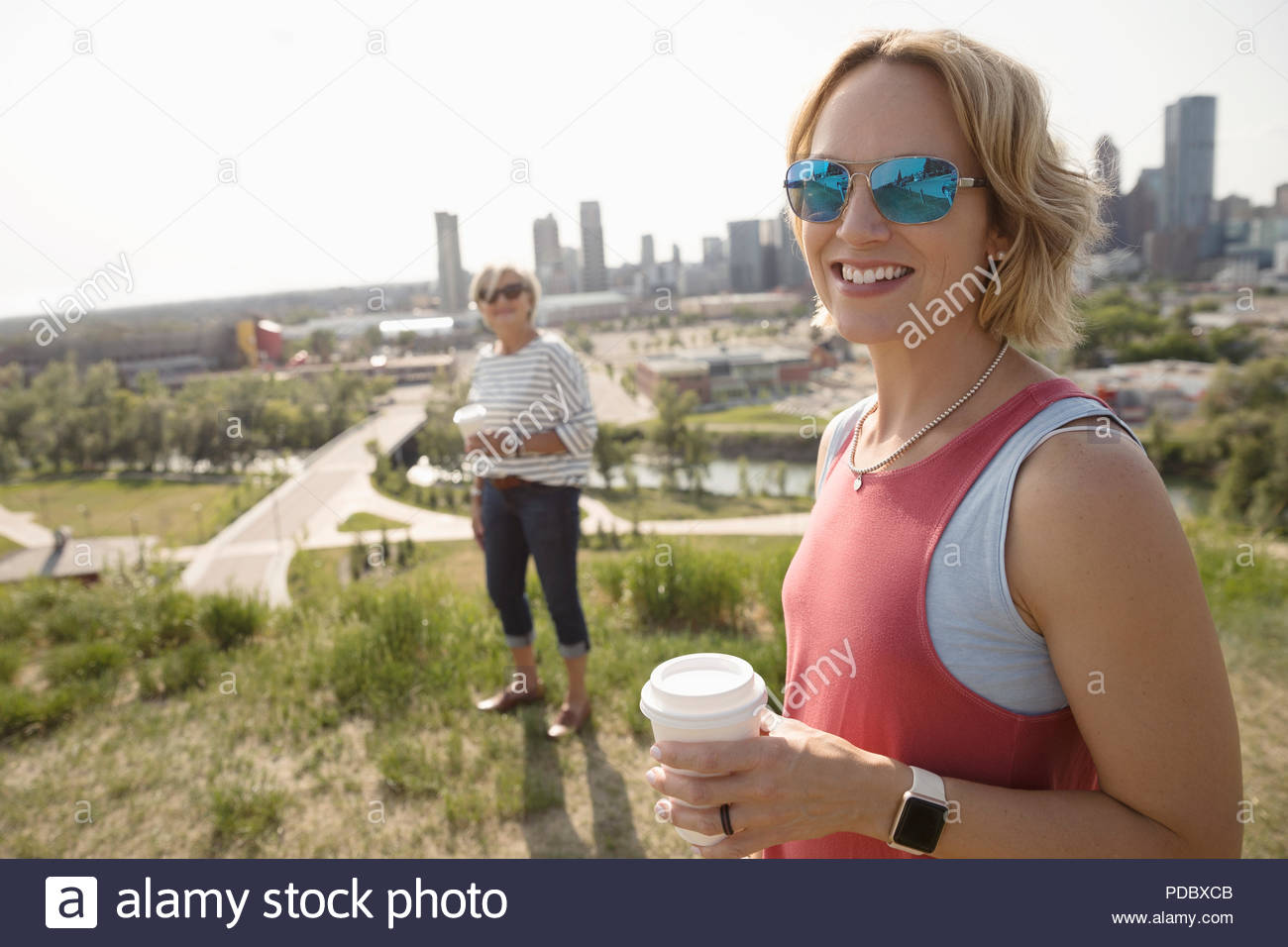 Walking and drinking and urban hi-res stock photography and images - Alamy