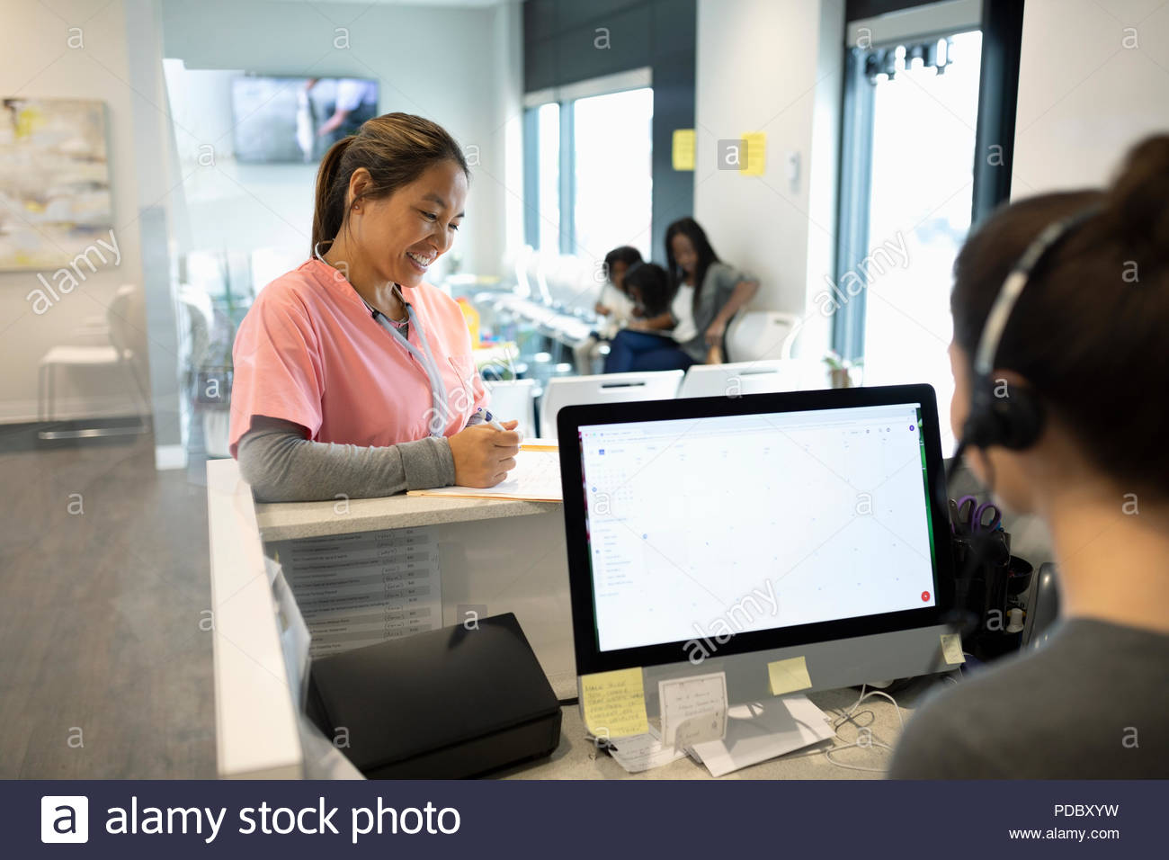 Group nurses looking at computer hi-res stock photography and images ...