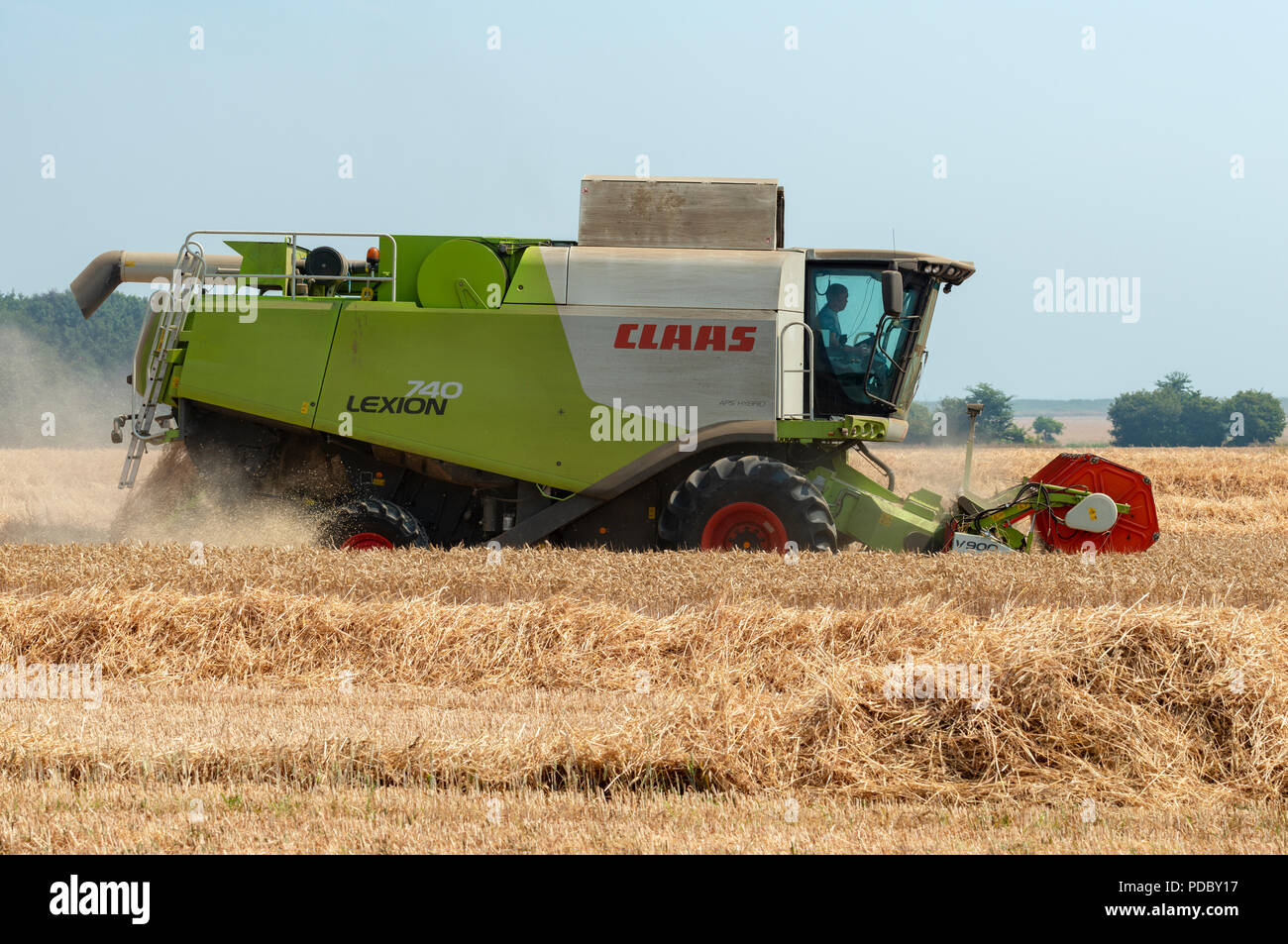 Class 740 lexion combine harvester hi-res stock photography and images ...