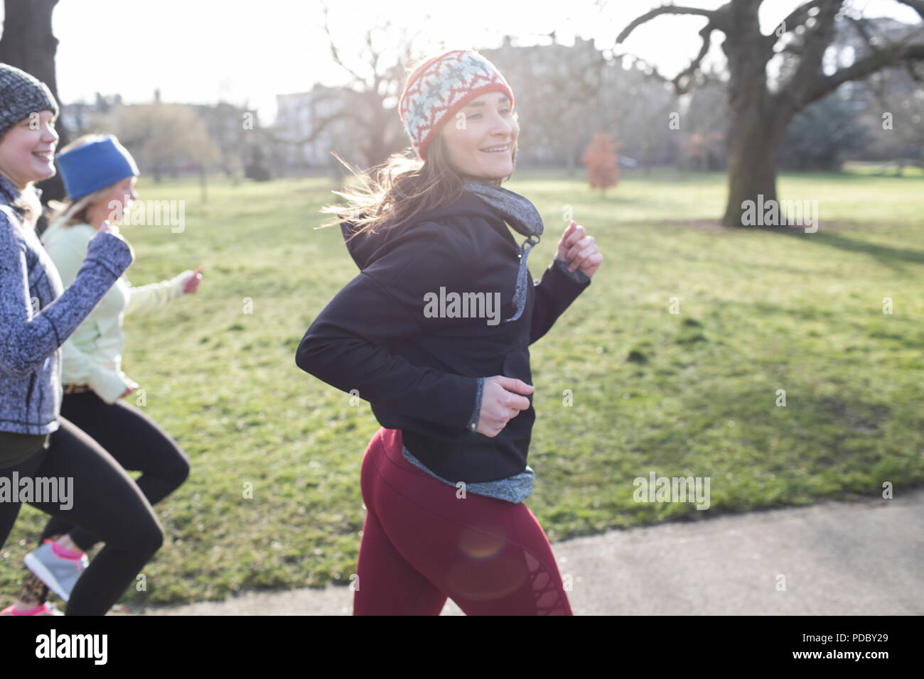 Female runner park hi-res stock photography and images - Alamy