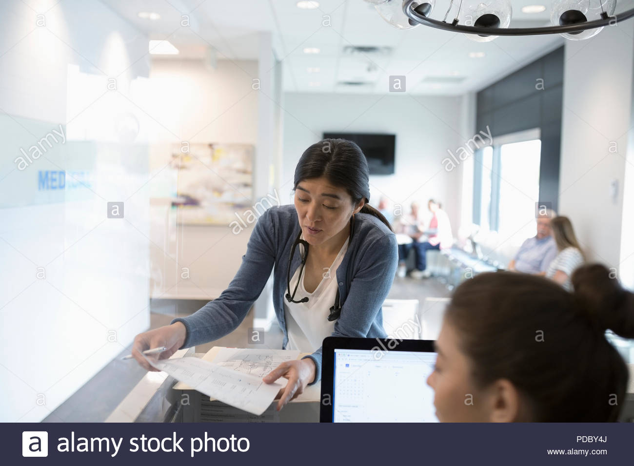 Doctors receptionist hi-res stock photography and images - Alamy
