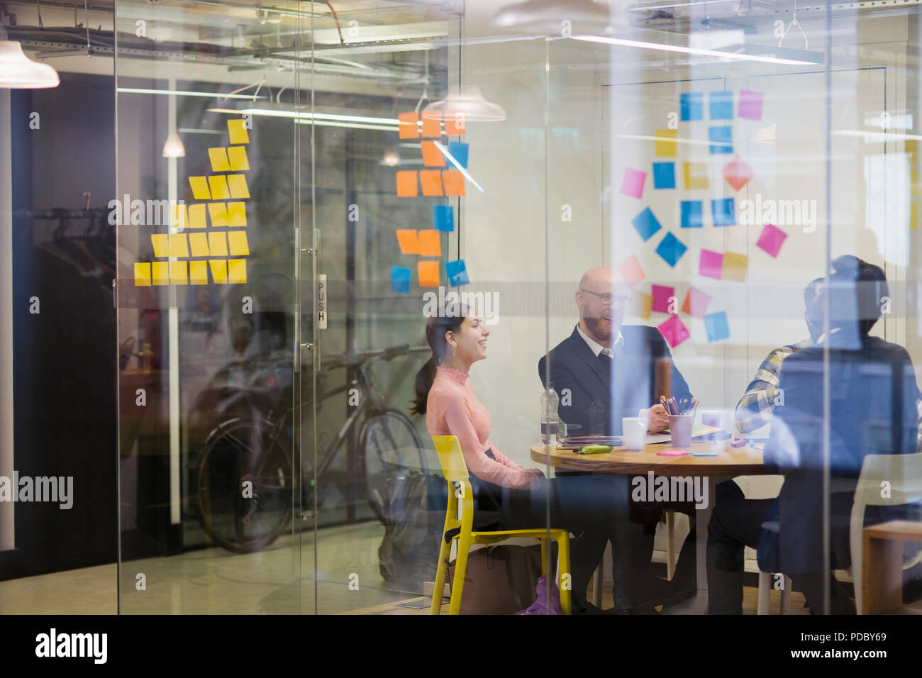 Creative business people brainstorming in conference room meeting Stock ...