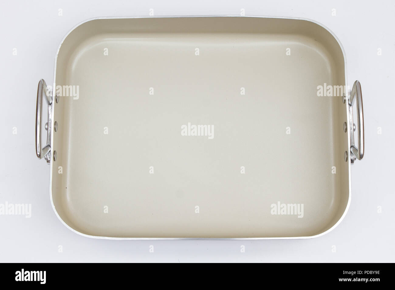 Empty metal baking dish isolated on white background Stock Photo - Alamy