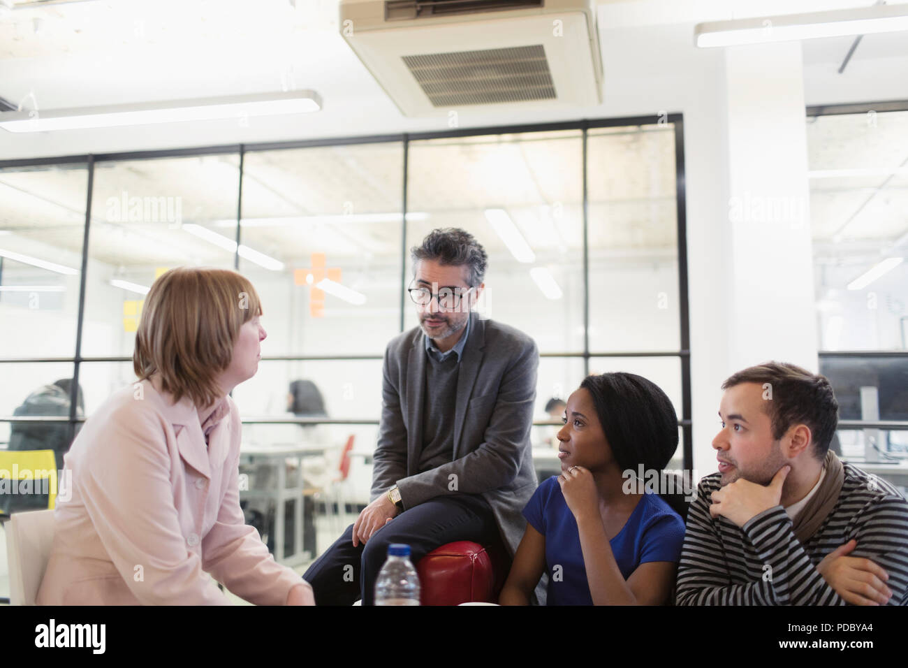 Creative business people talking in office meeting Stock Photo - Alamy