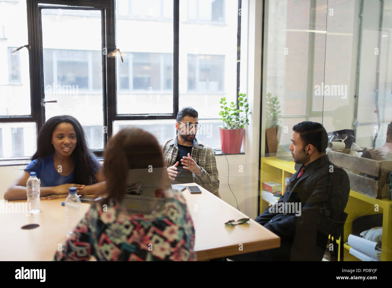 Business people talking in conference room meeting Stock Photo - Alamy