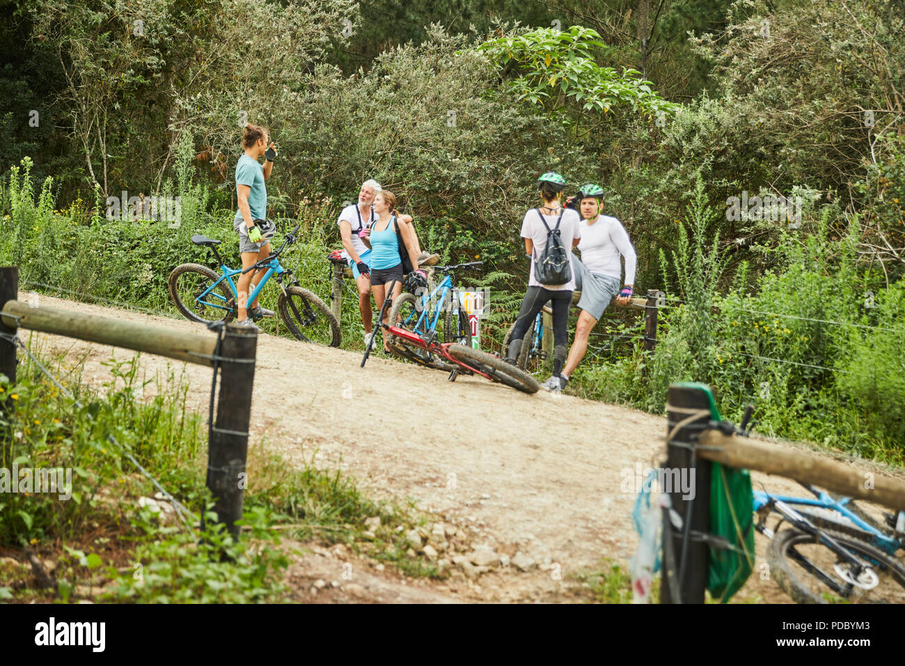 Woman on bike resting hi-res stock photography and images - Alamy