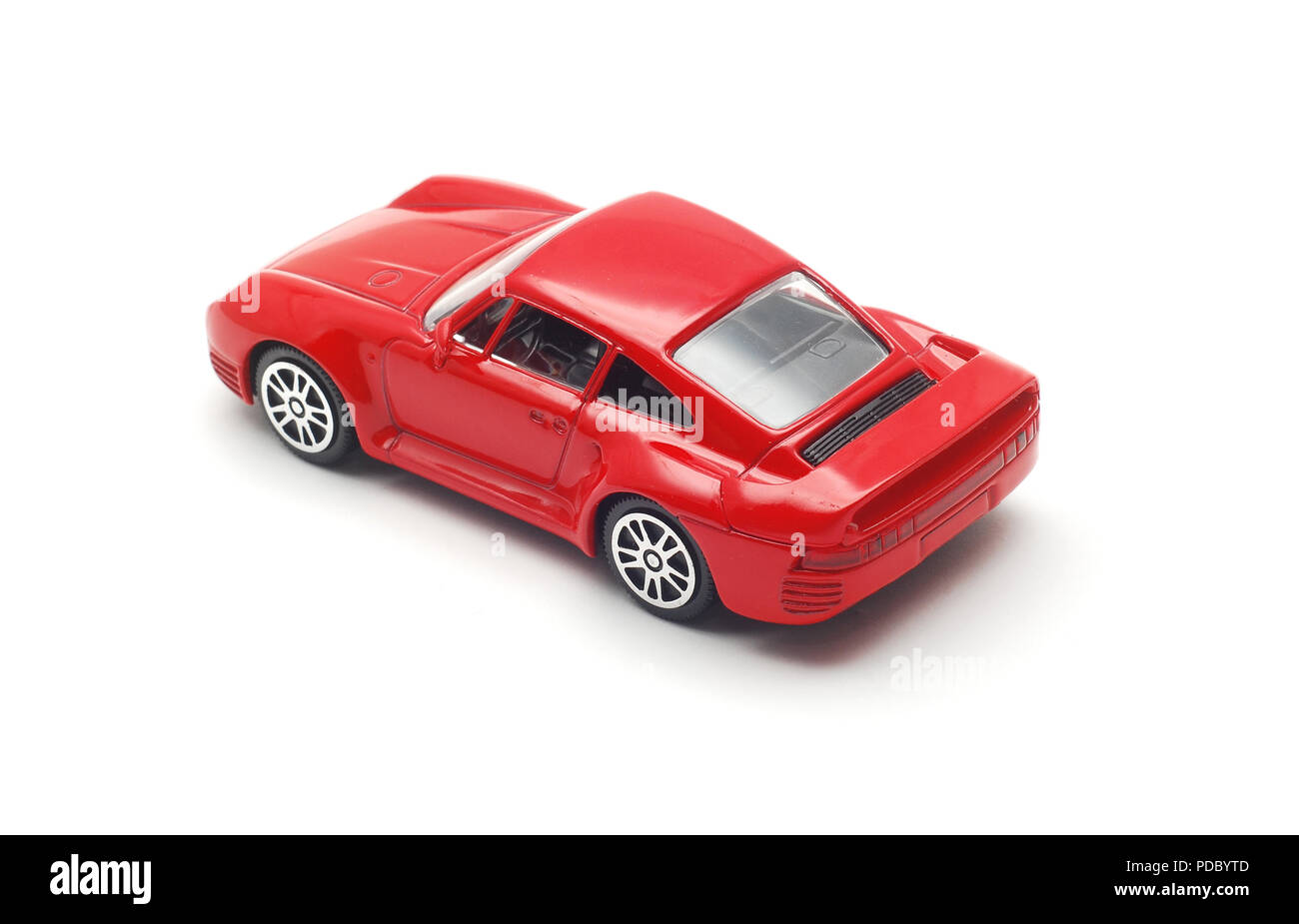 Red toy car isolated on white Stock Photo - Alamy
